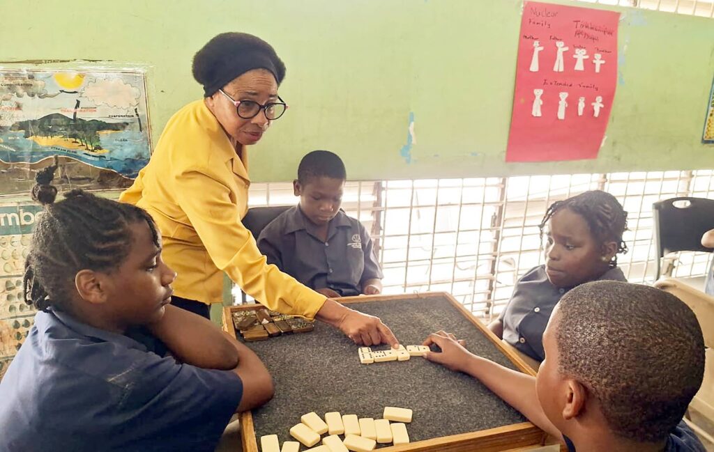 Dominoes provides formula for learning at Joy Town Development ...