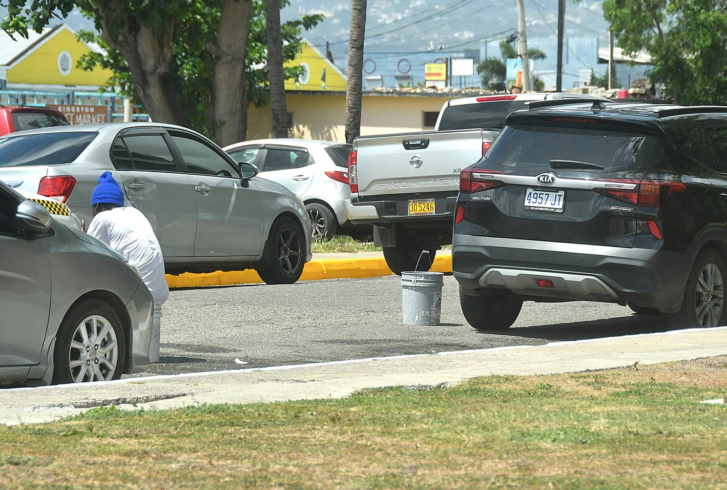 Buckets, barriers and ‘blessings’ - Jamaica Observer